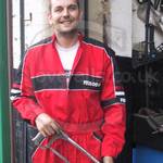 Garage Mechanics wearing greasy overalls - coveralls.co.uk